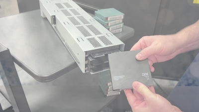 Inserting service magazine cartridges in the Diamondback tape library ...