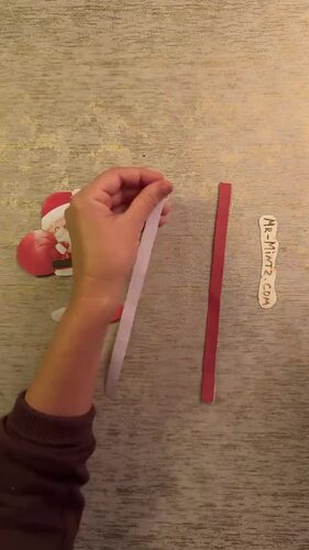 Santa Claus in Motion Origami Craft – Christmas Jumping Toy for Kids