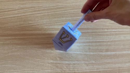 Hanukkah Reading Passage and Paper Dreidel Holiday Craft | TPT