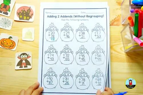 Halloween Addition and Subtraction Worksheet by The Joy in Teaching