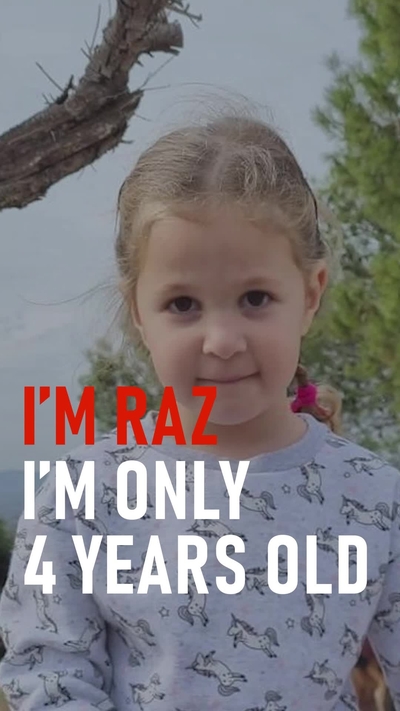 Raz Katz Asher, a mischievous child of happiness with golden curls and ...